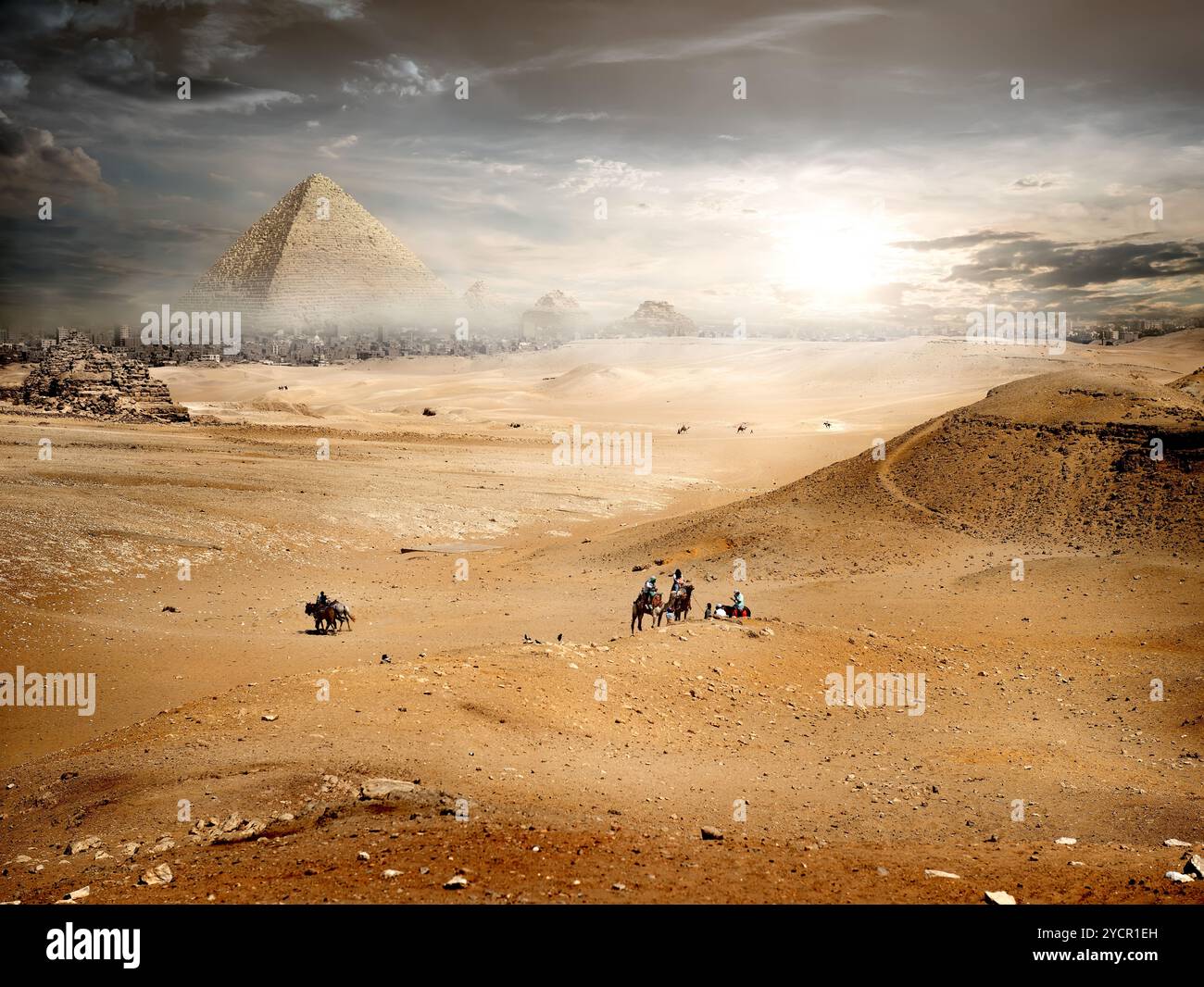Fog and storm clouds over pyramid in desert Stock Photo - Alamy