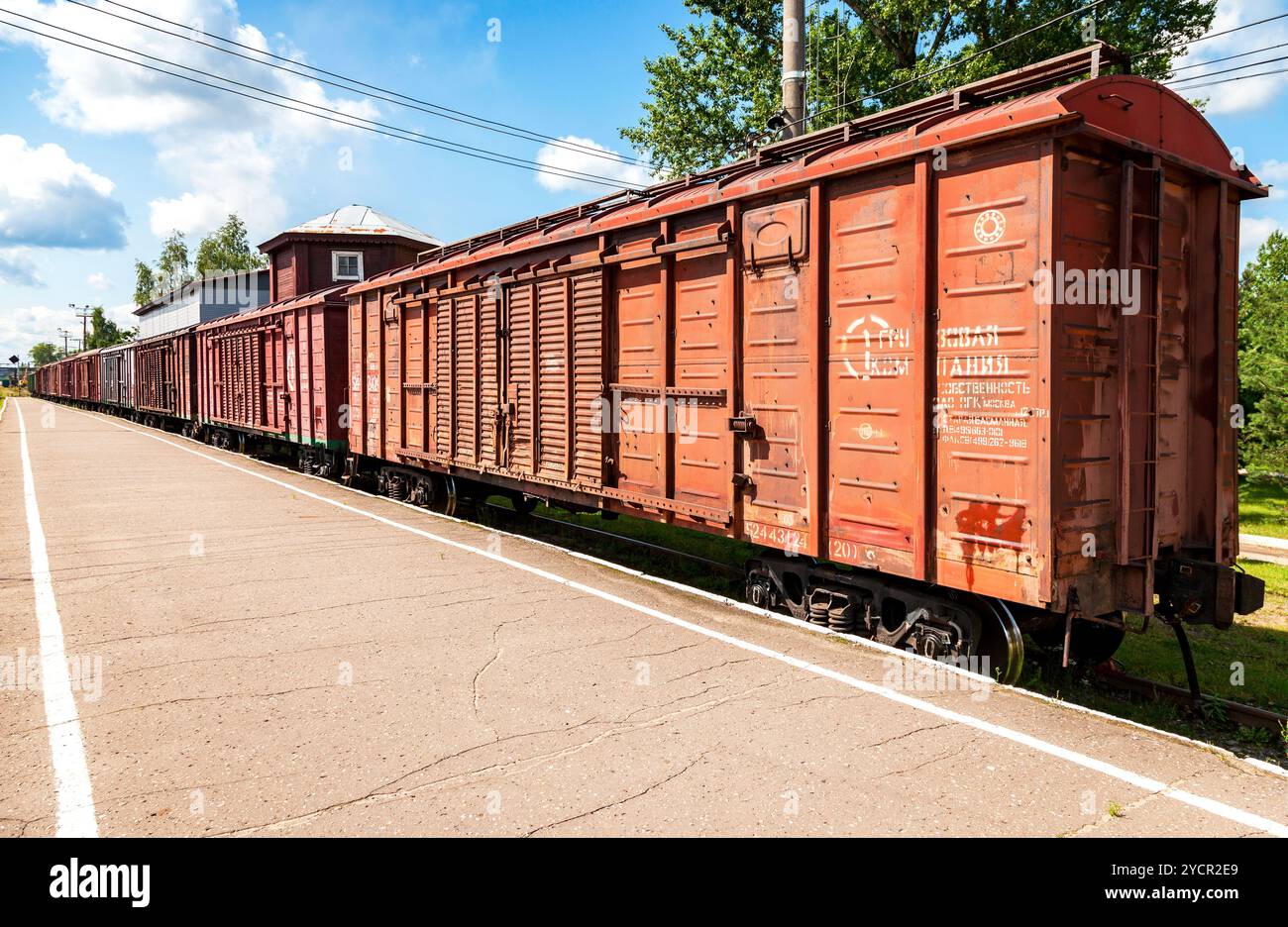 Cars of a freight train standing at a provincial railway station Stock ...