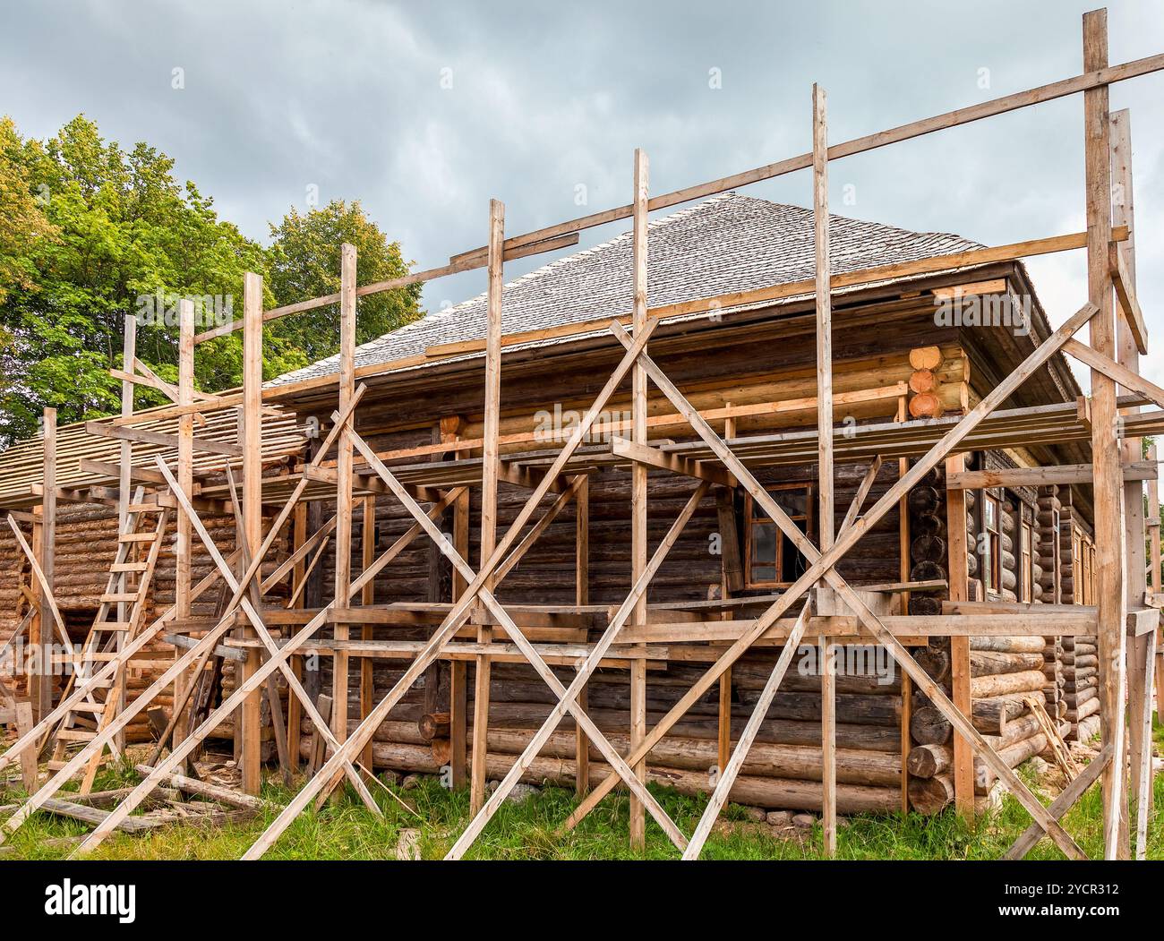 Reconstruction of old wooden house in russian village Stock Photo - Alamy