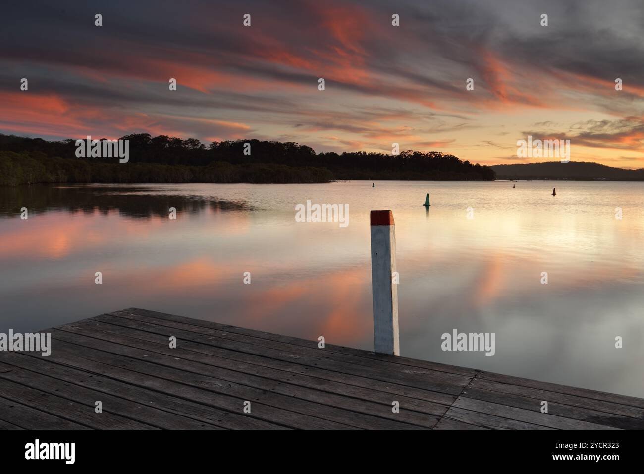 Amazing sunset colours and reflections from the timber jetty Stock ...
