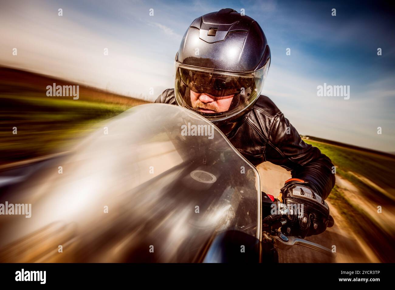 Motorcyclist on road racing hi-res stock photography and images - Alamy