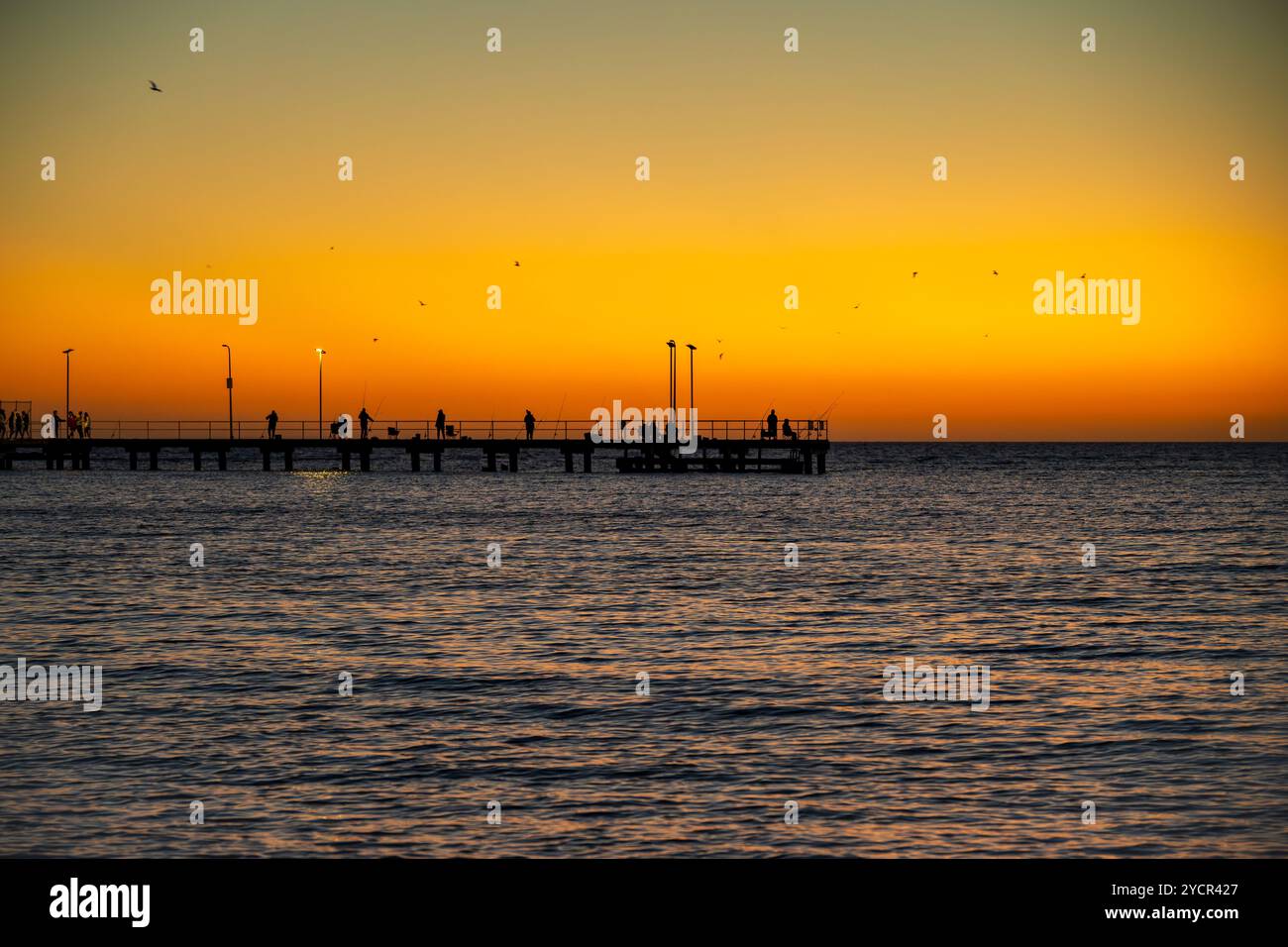 Sunset over the horizon at Black Rock Jetty, Sandringham, Melbourne ...