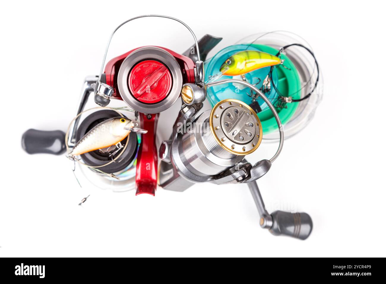 On top different fishing tackles with white background Stock Photo - Alamy