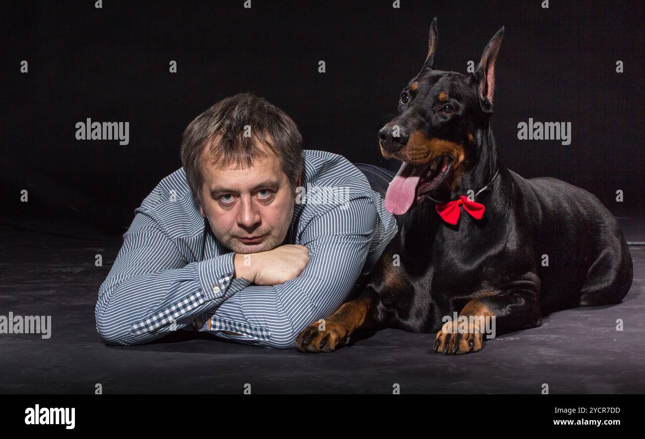 Man dog in studio hi-res stock photography and images - Alamy