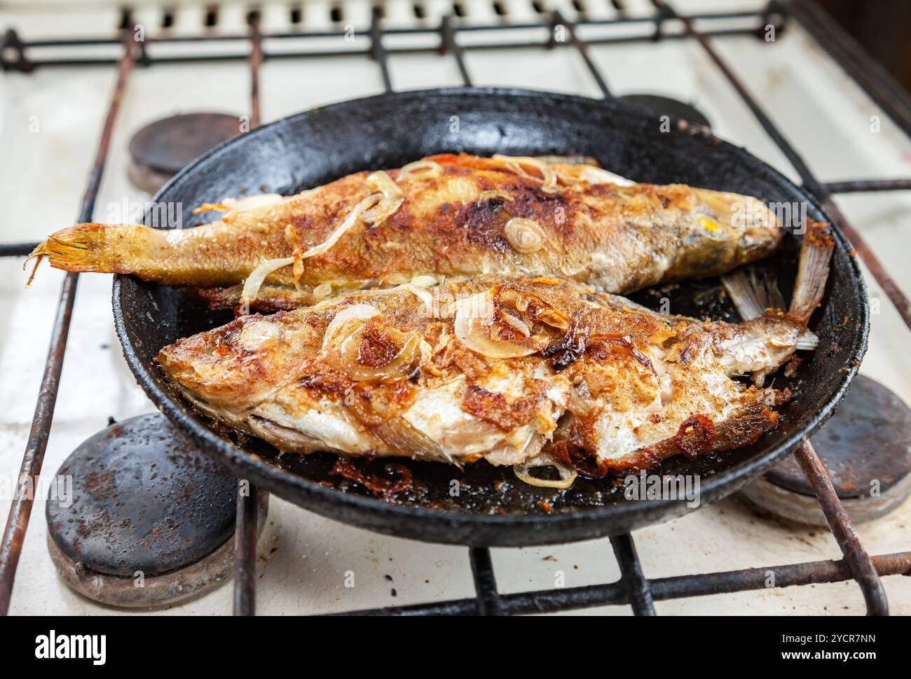 Fish pan dinner hot cook hi-res stock photography and images - Alamy