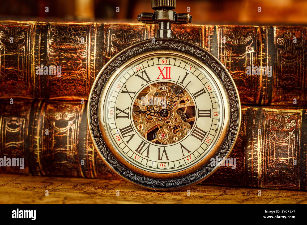 Old Books and Vintage pocket watch Stock Photo - Alamy