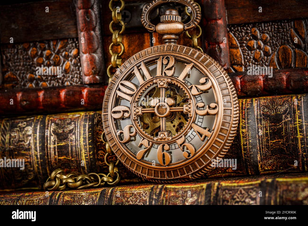 Old Books and Vintage pocket watch Stock Photo - Alamy