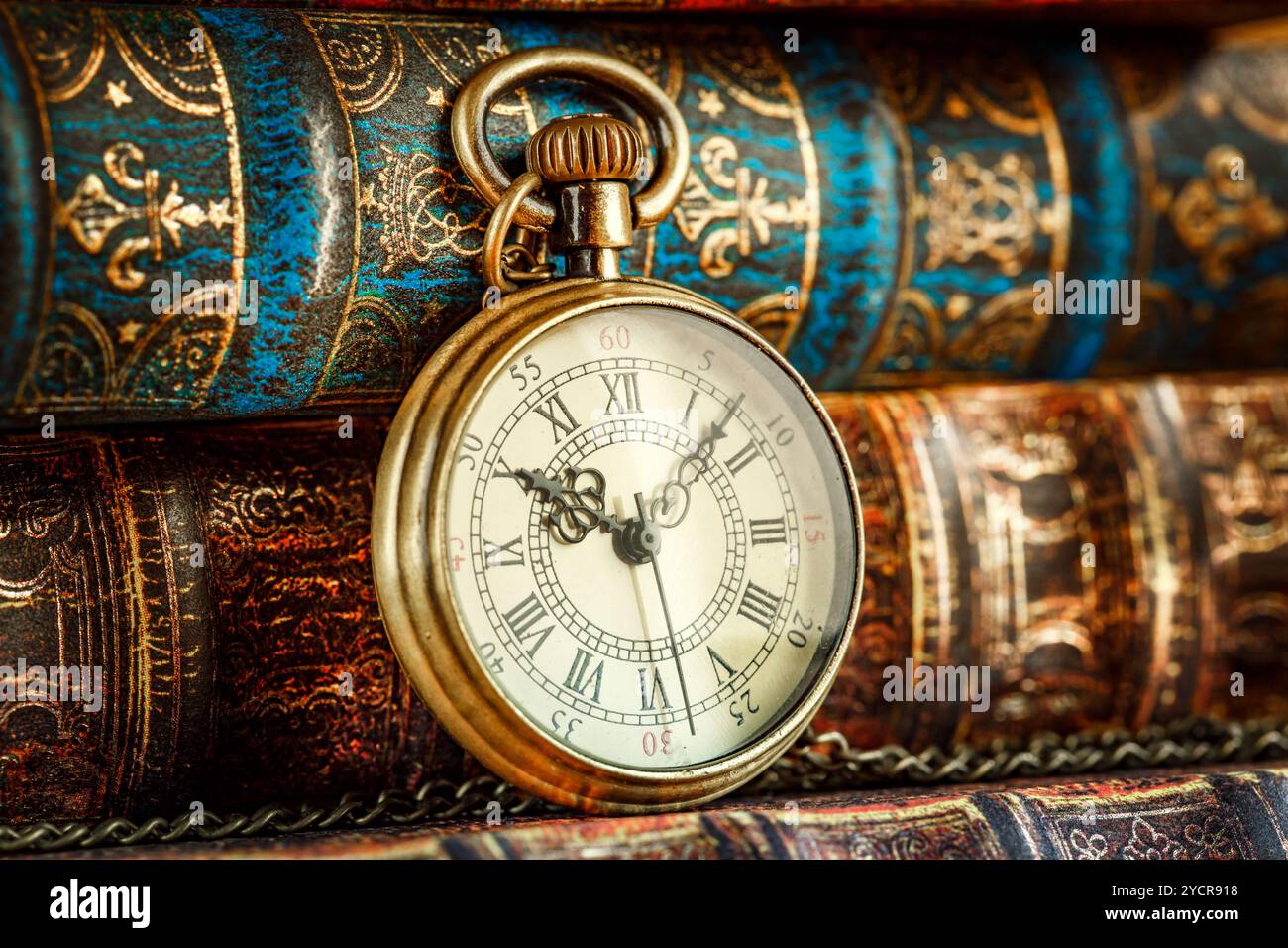 Old Books and Vintage pocket watch Stock Photo - Alamy