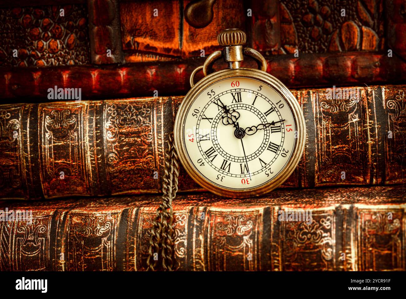 Old Books and Vintage pocket watch Stock Photo - Alamy