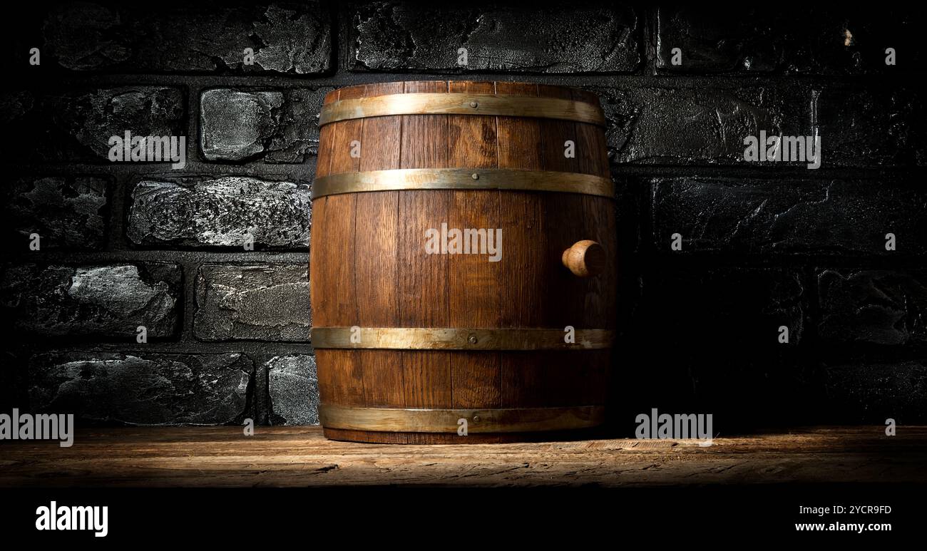 Barrel and brick wall Stock Photo - Alamy