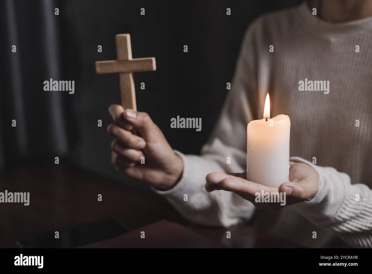 Praying woman hands together cross hi-res stock photography and images ...
