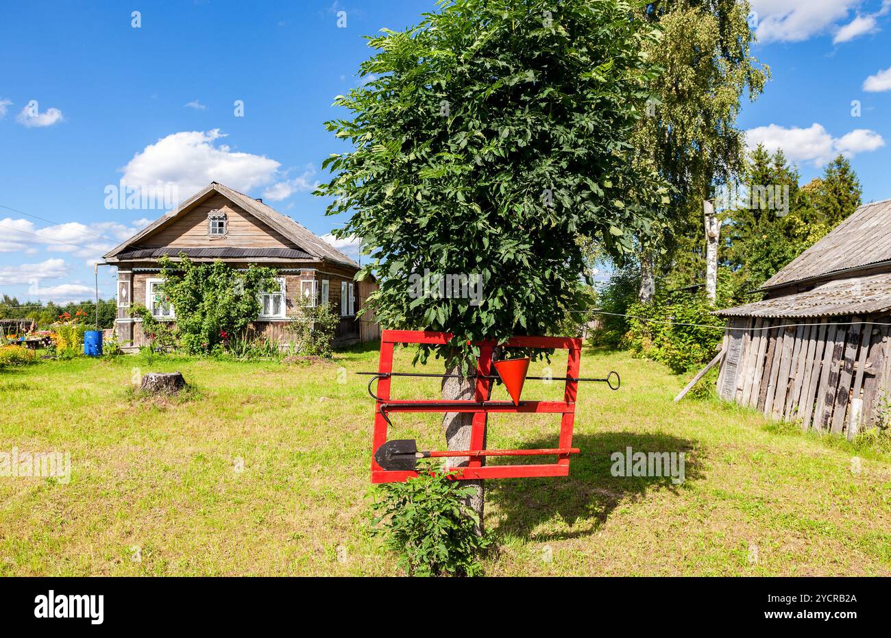Firefighter shield with fire extinguishing tools in Russian village ...