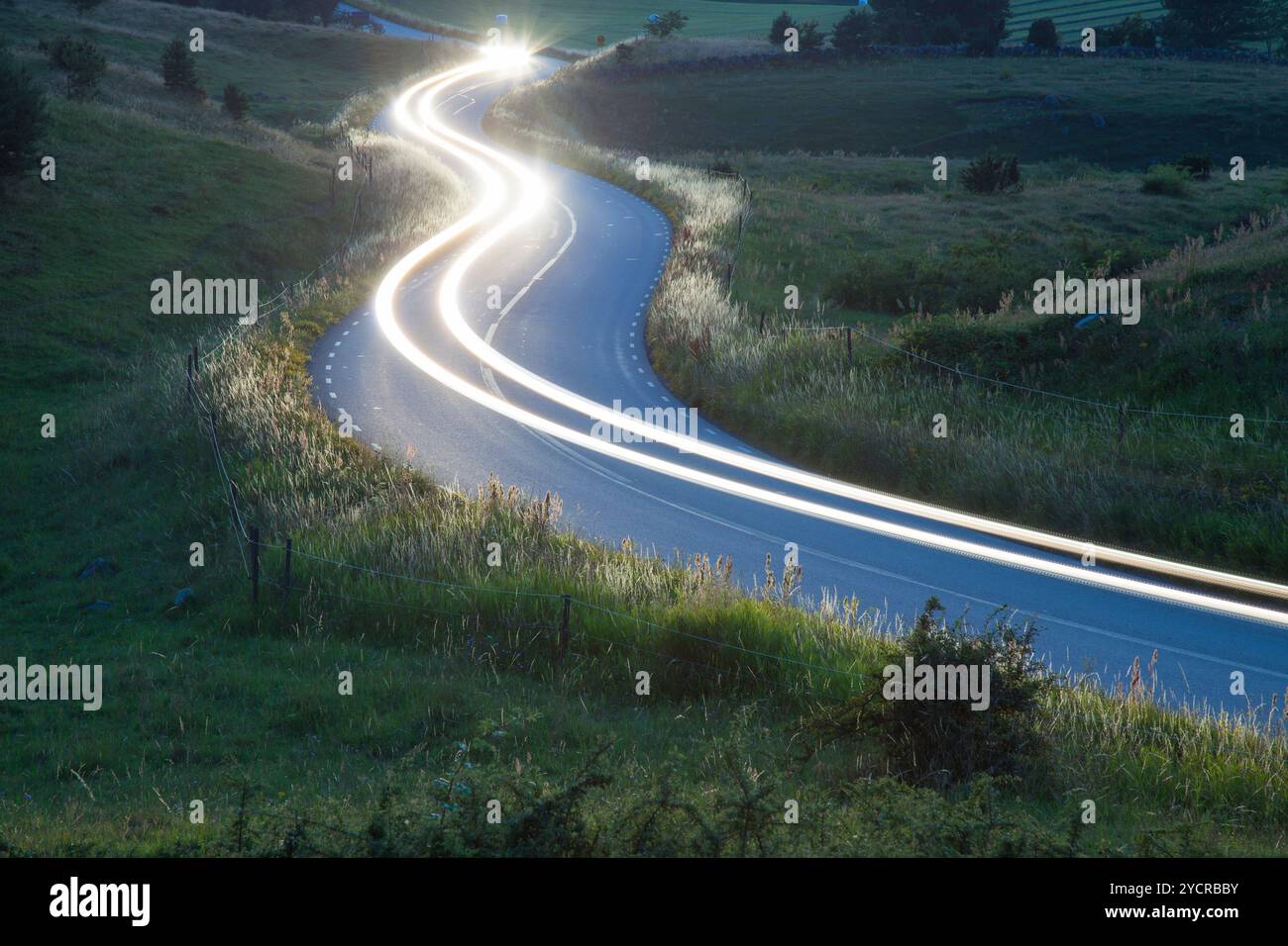 Long winding road curves hi-res stock photography and images - Alamy