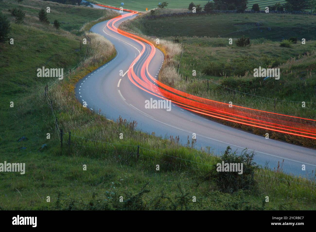 Winding countryside road curves hi-res stock photography and images - Alamy