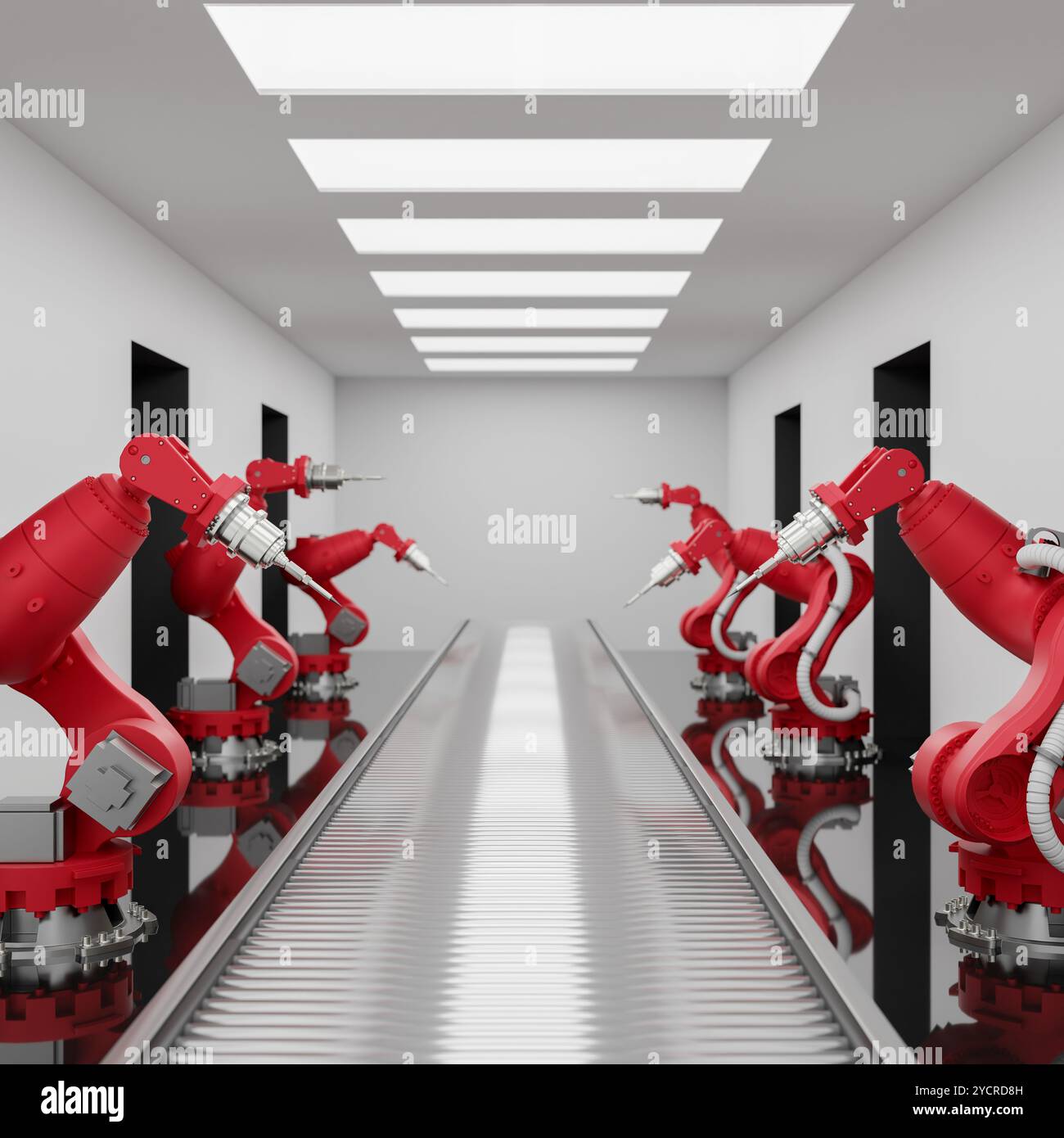 Red robotic assembly arms in a production line over a conveyor belts in ...