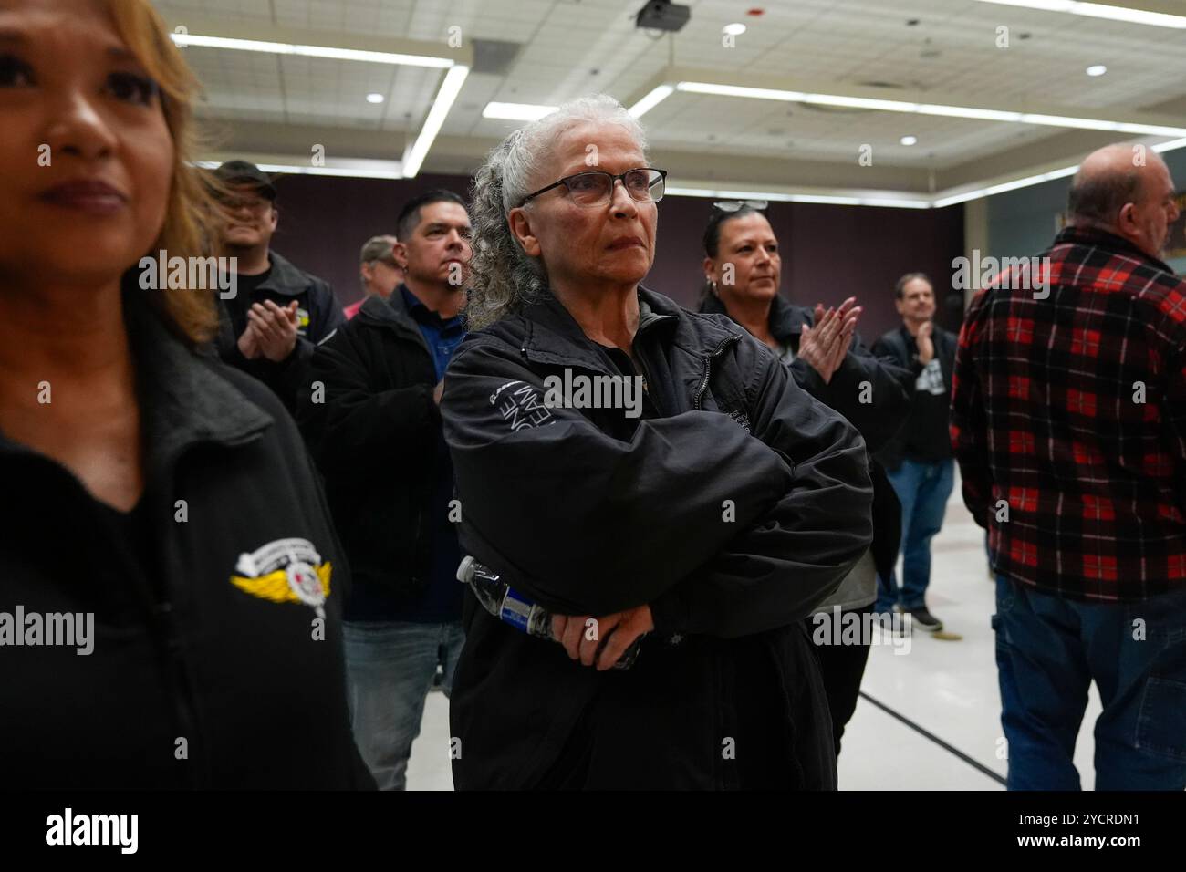 Boeing union members listen as IAM District 751 president Jon Holden ...