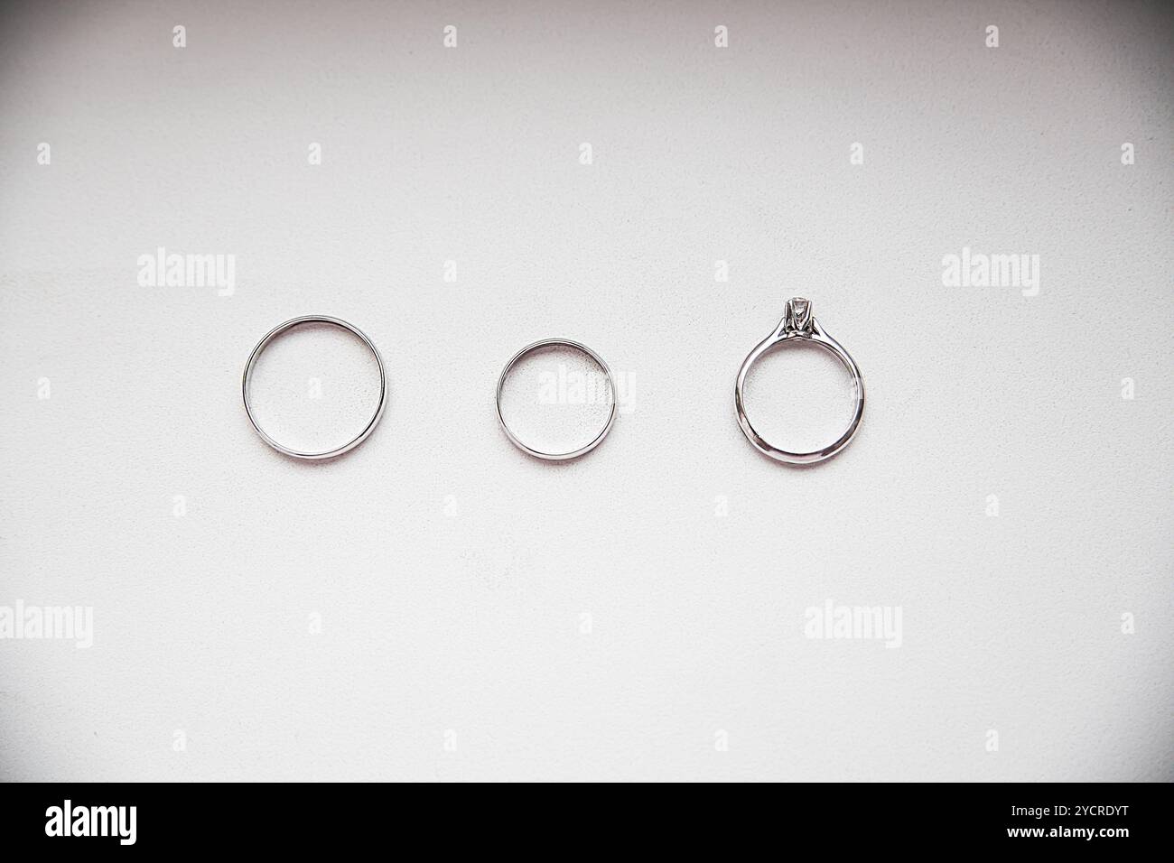 Three wedding rings Stock Photo - Alamy