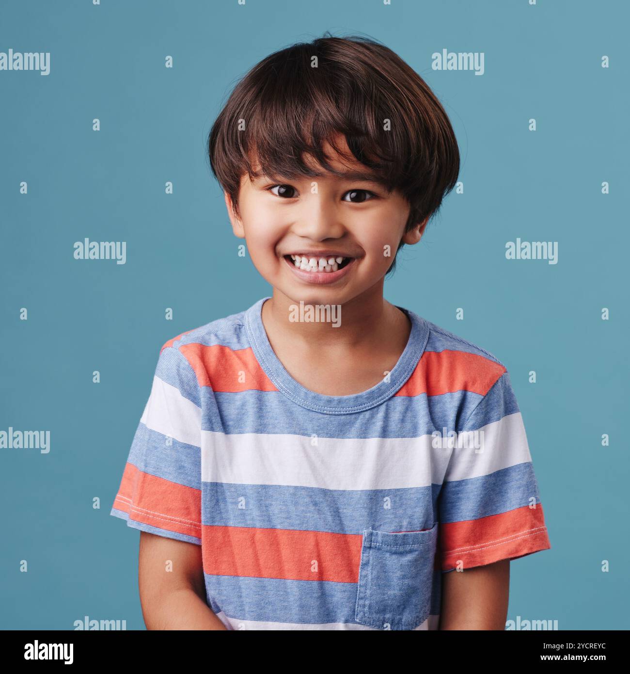 Japanese kid, boy and satisfied in studio background for fashion with ...