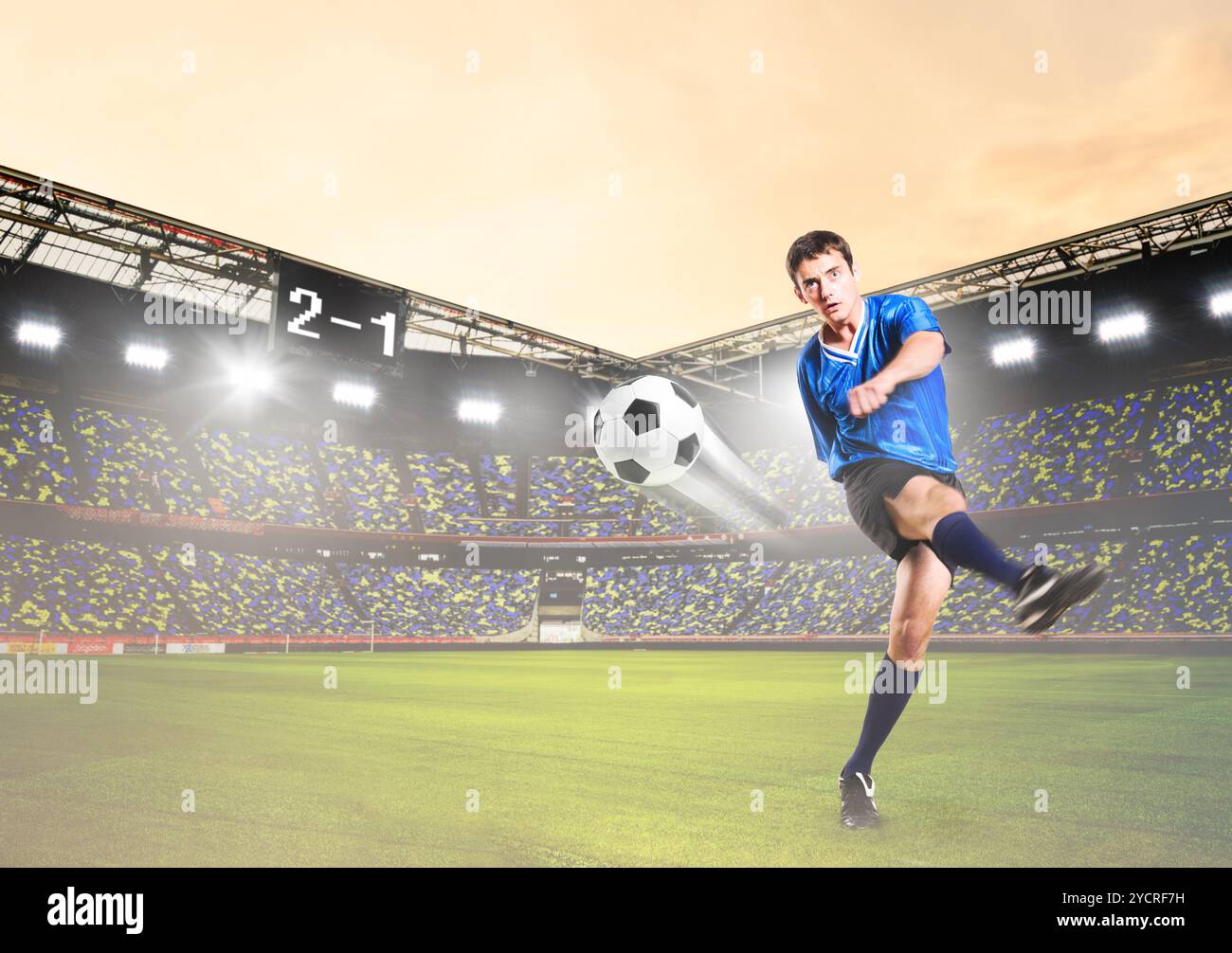 Football player kicking ball hi-res stock photography and images - Alamy