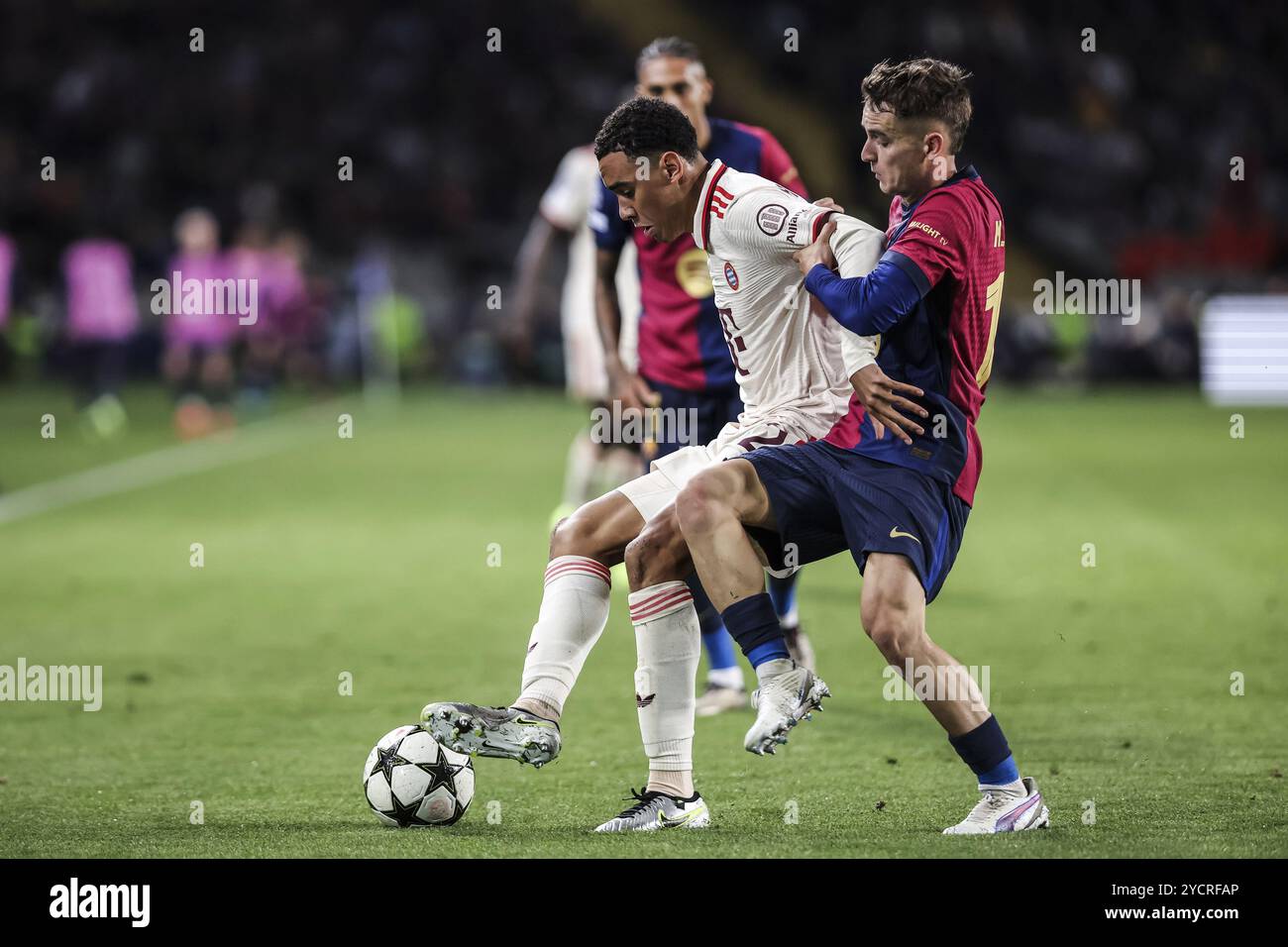Jamal Musiala of Bayern Munich and Marc Casado of FC Barcelona during ...