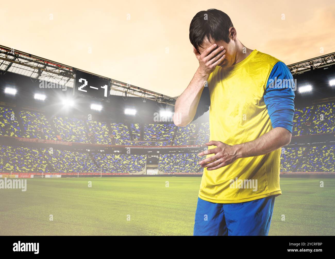 Sad soccer player Stock Photo - Alamy