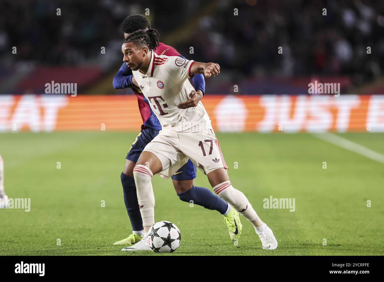 Michael Olise of Bayern Munich and Alejandro Balde of FC Barcelona ...