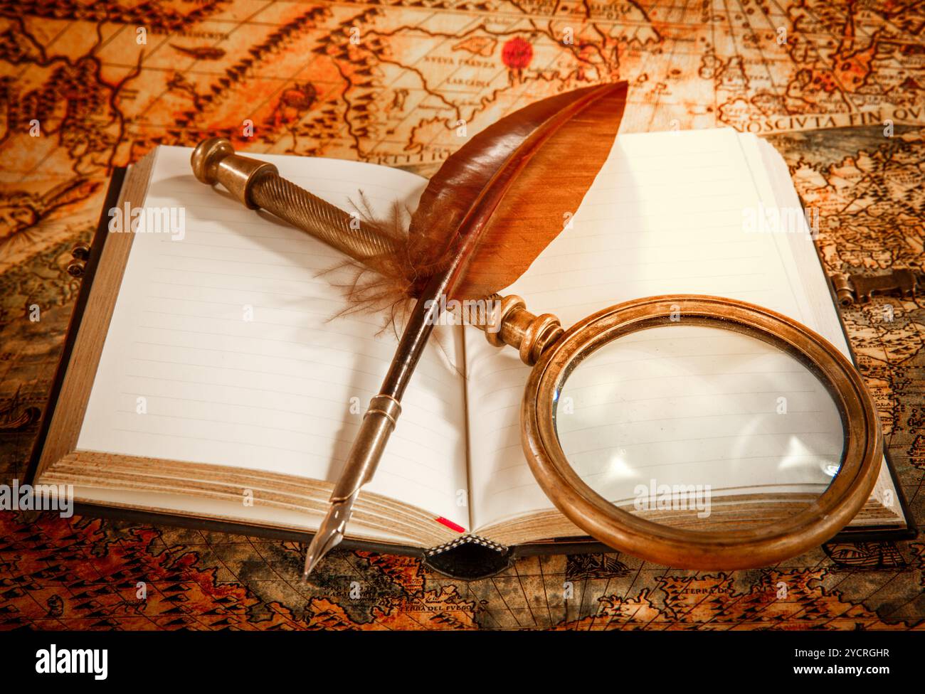 Vintage magnifying glass lies on an ancient world map Stock Photo - Alamy