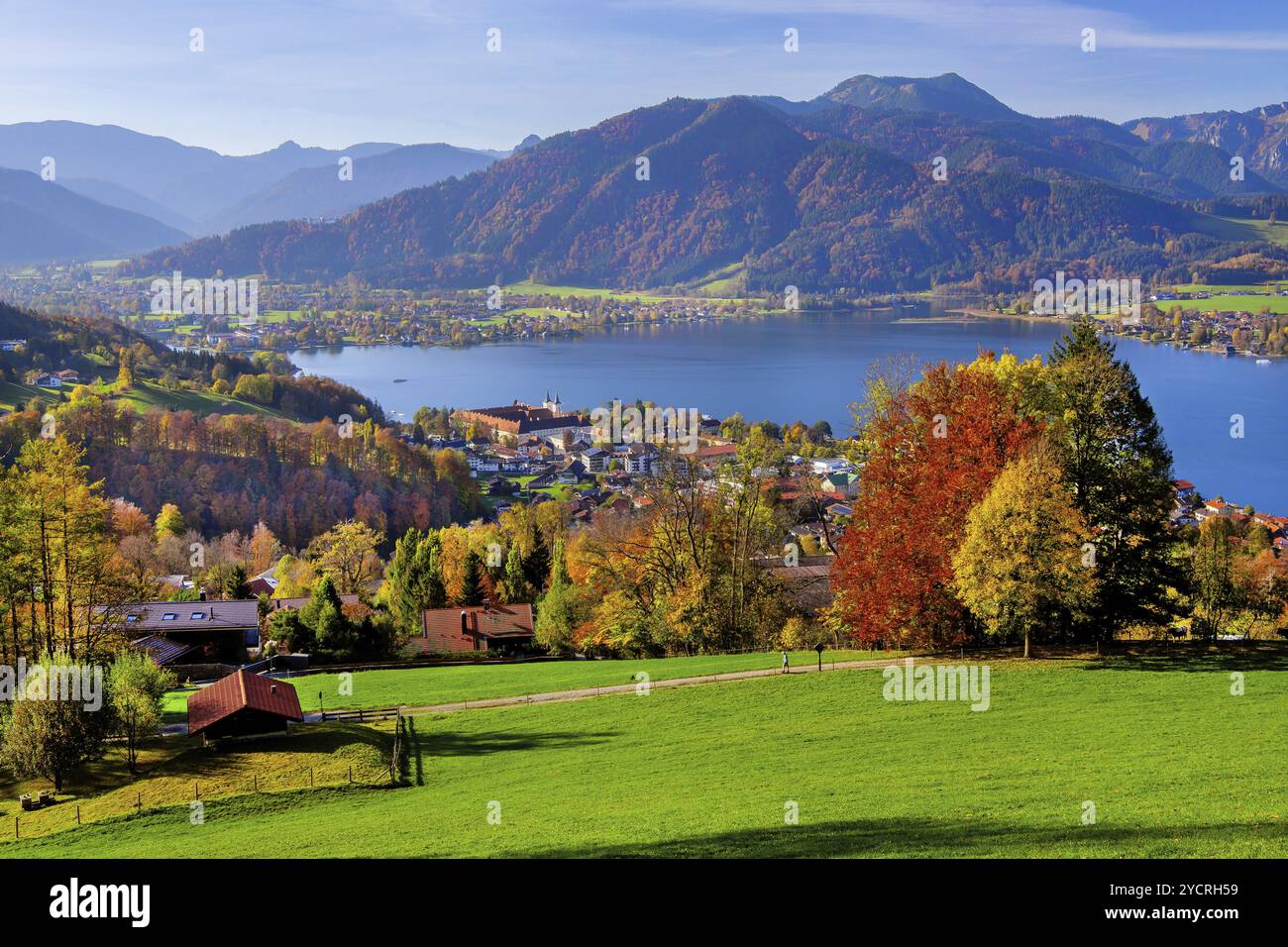 Panorama of the village and lake with the monastery castle in autumn ...