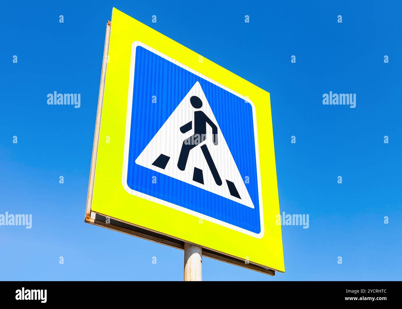 Blue sky people crossing sign hi-res stock photography and images - Alamy