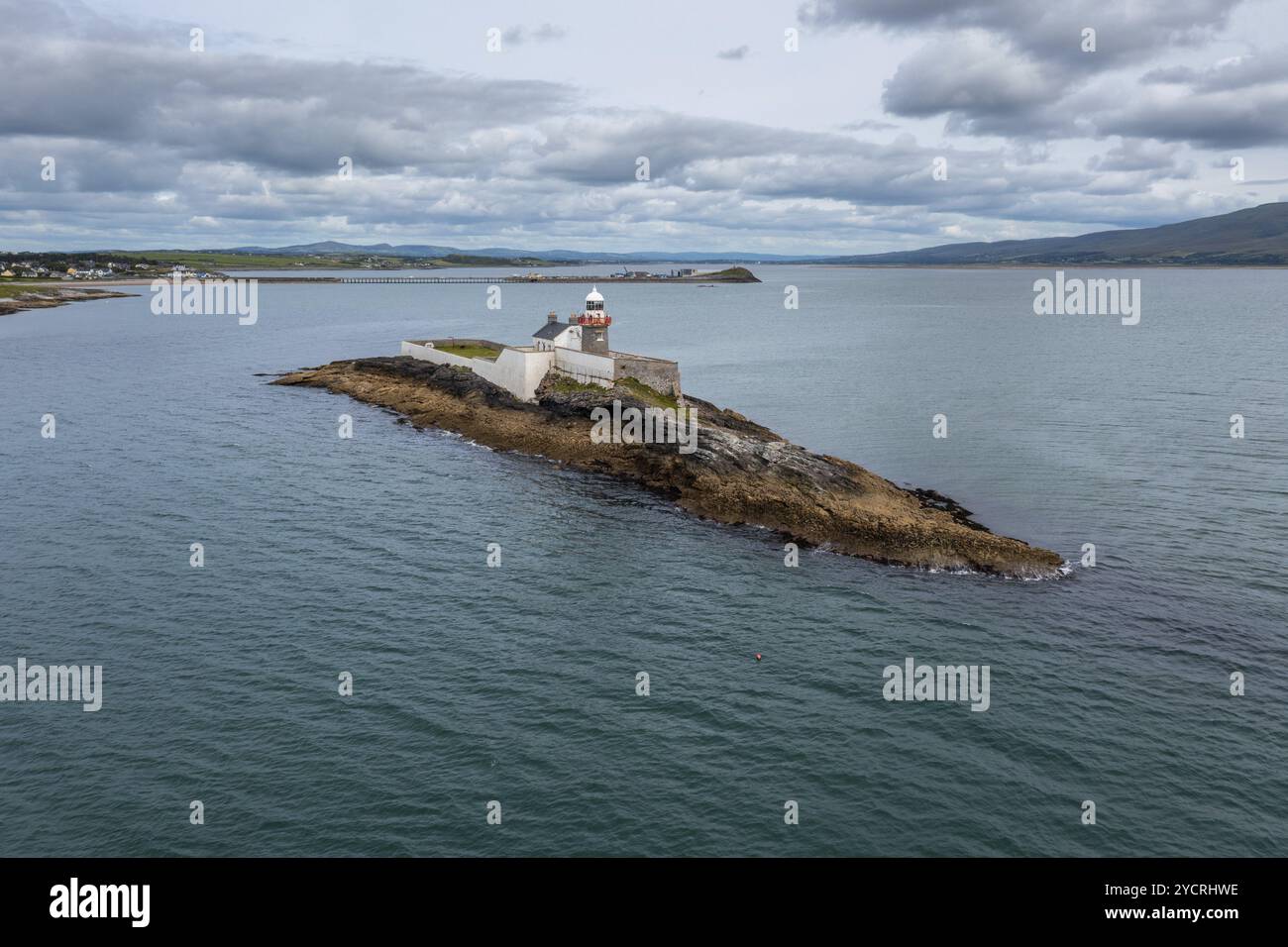 Aerial view of the historic Fenit Lighthouse on Little Samphire Island ...
