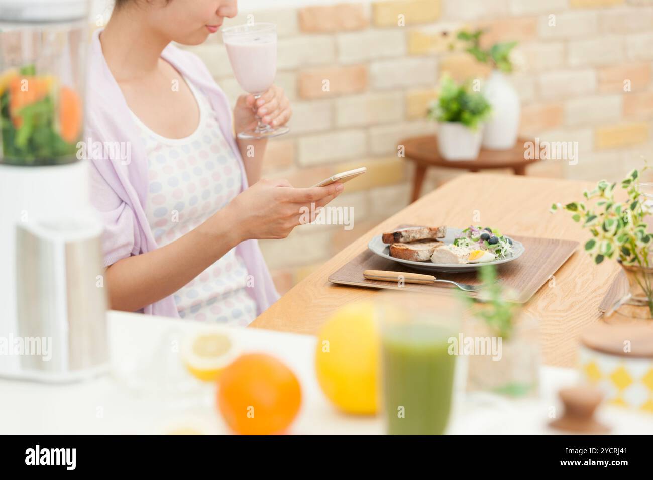 Woman operating phone table hi-res stock photography and images - Alamy