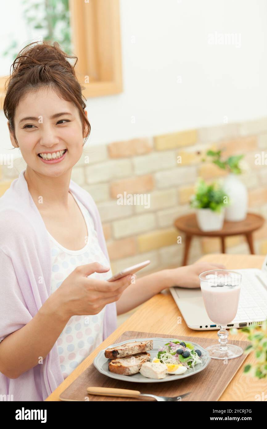 Woman operating phone table hi-res stock photography and images - Alamy