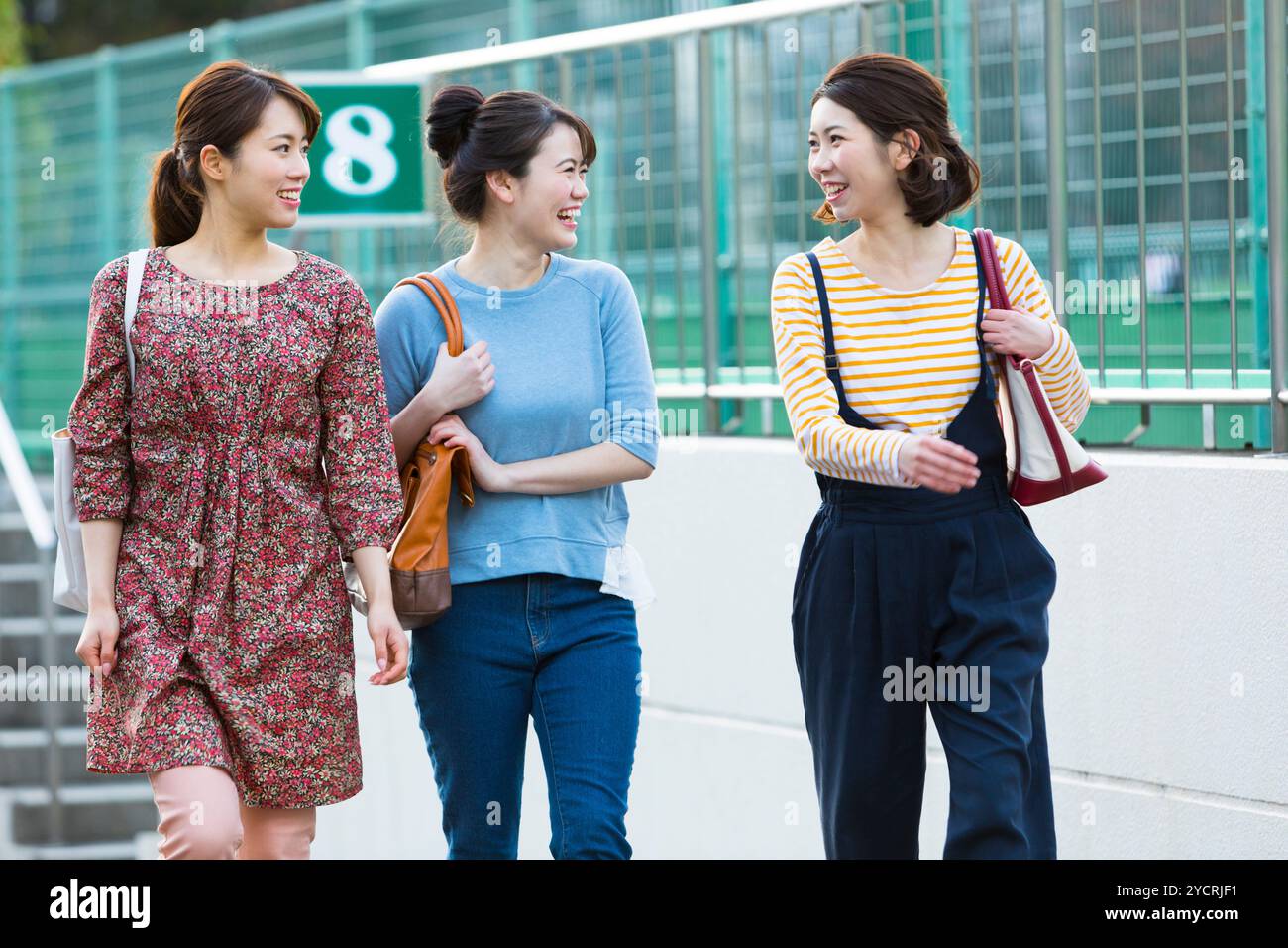 Three college girls Stock Photo - Alamy