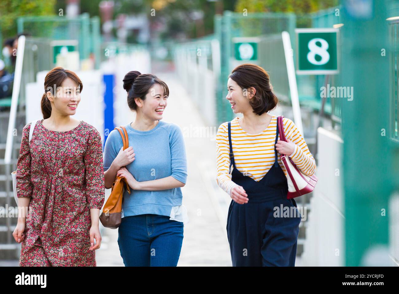 Three college girls Stock Photo - Alamy
