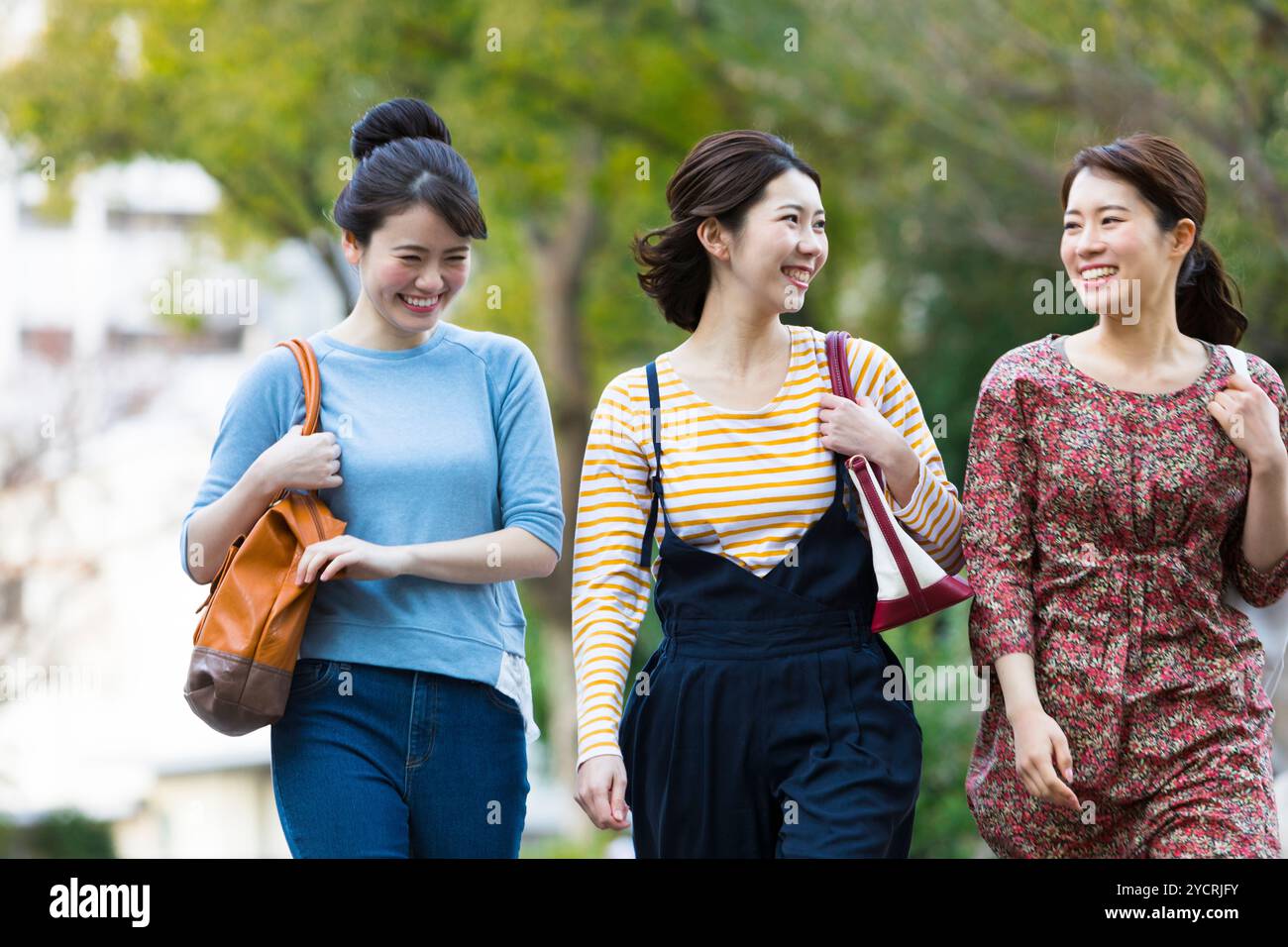 Three college girls Stock Photo - Alamy
