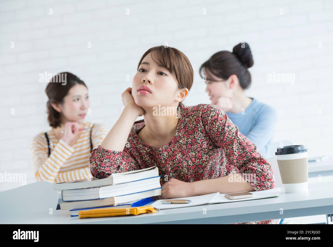 Female university students taking classes Stock Photo - Alamy