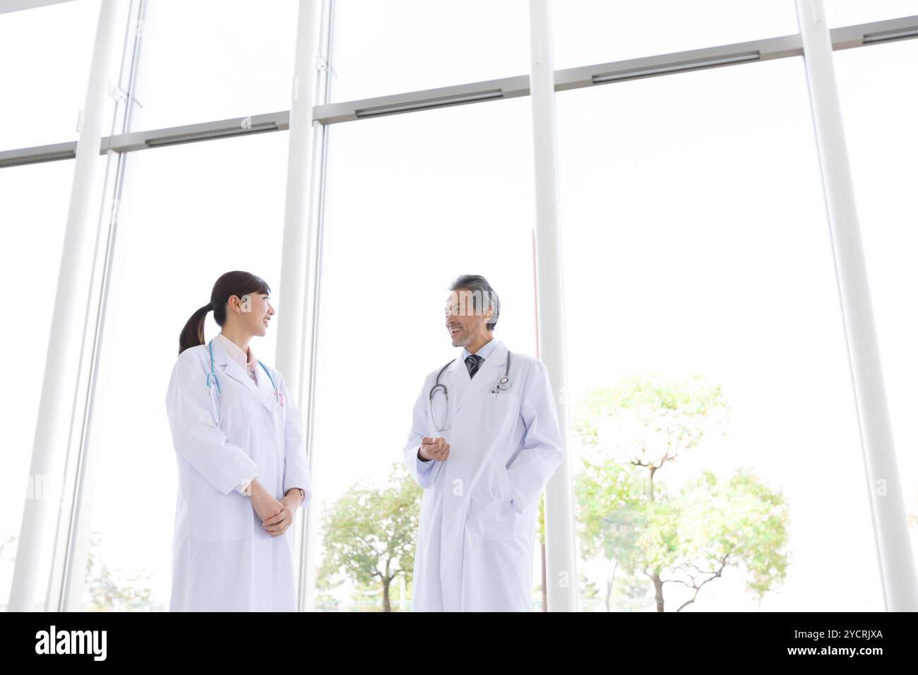 Middle aged medical doctor talking hi-res stock photography and images ...