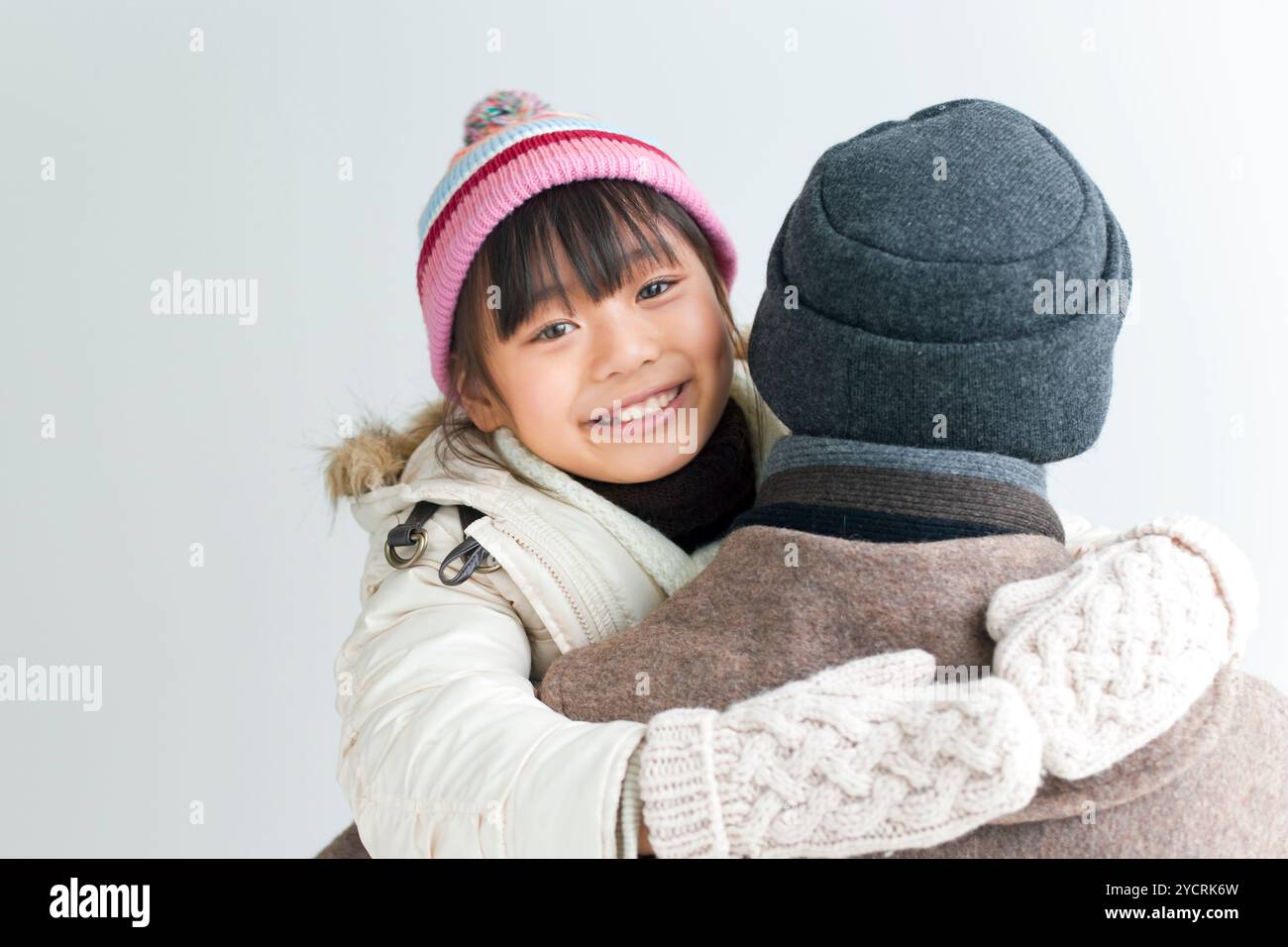 Daughter hugging her father Stock Photo - Alamy