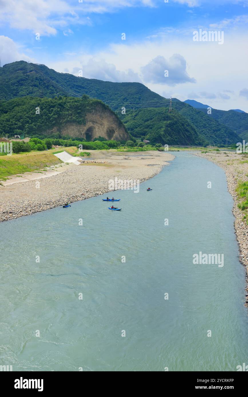 Canoeing and the Chikuma River and Half Passing Rock Nose Stock Photo ...