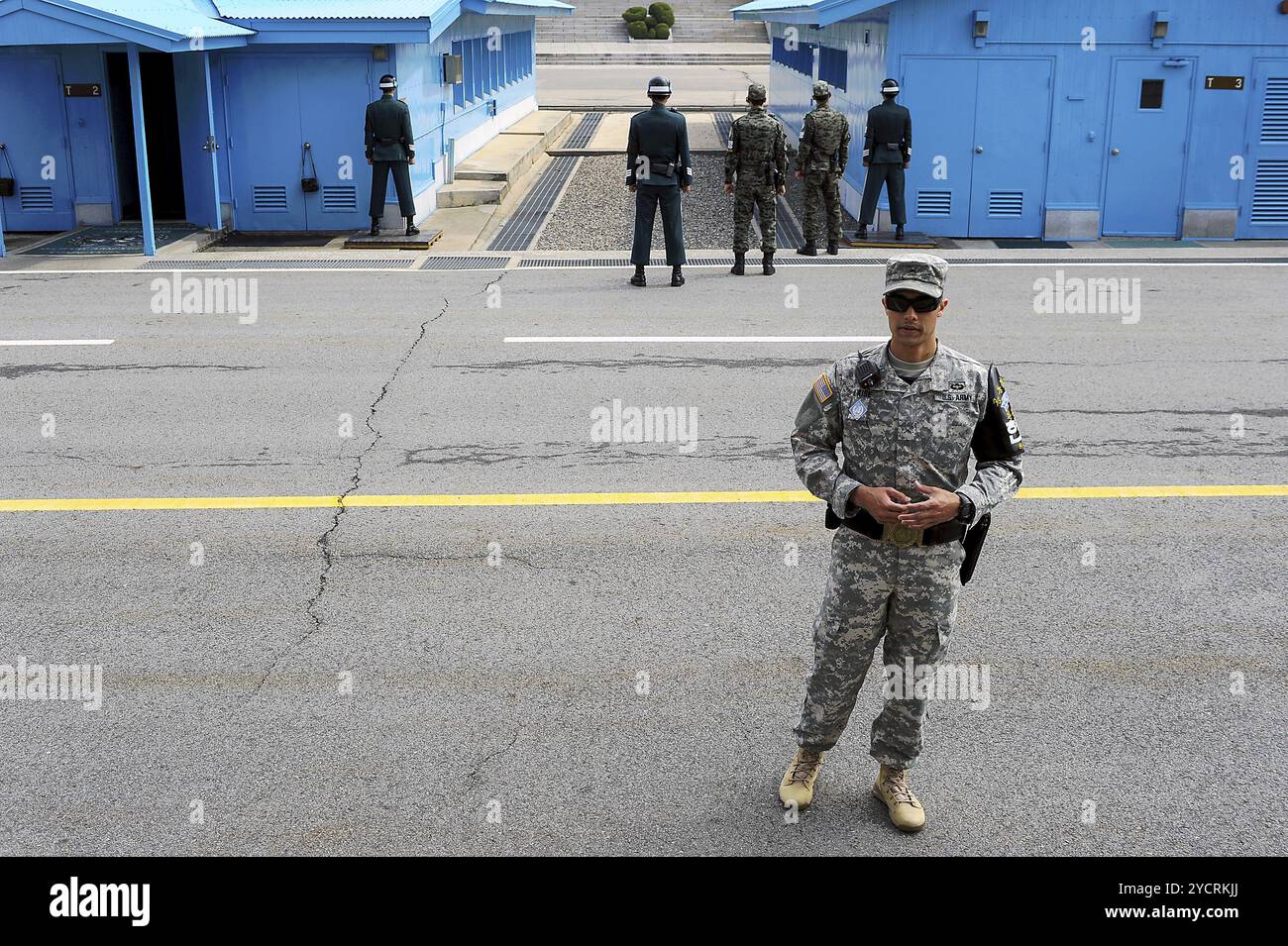 02.05.2013, Panmunjom, South Korea, Asia, A US Marine stands with South ...