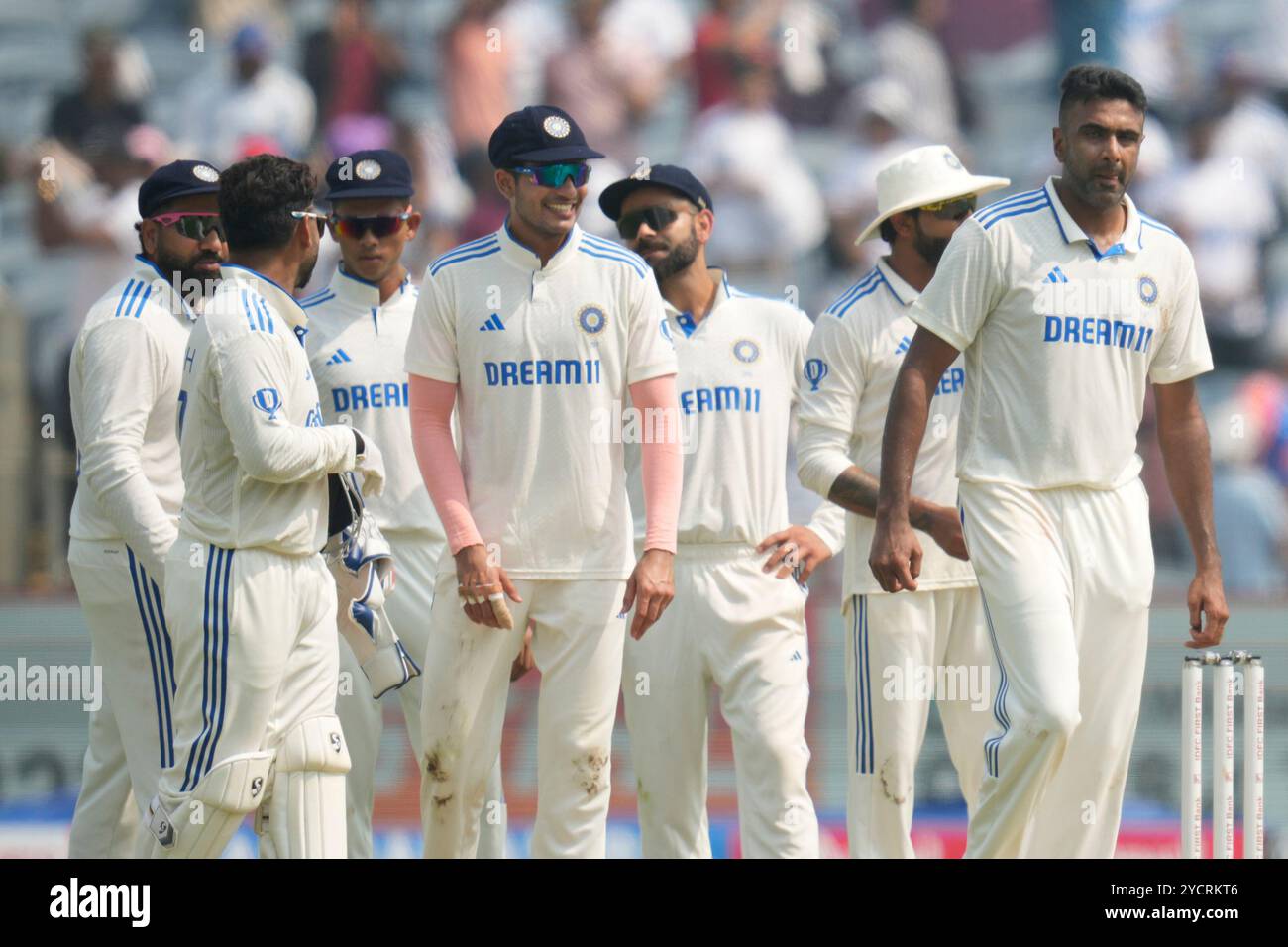 India's Ravichandran Ashwin , right, celebrates the dismissal of New ...