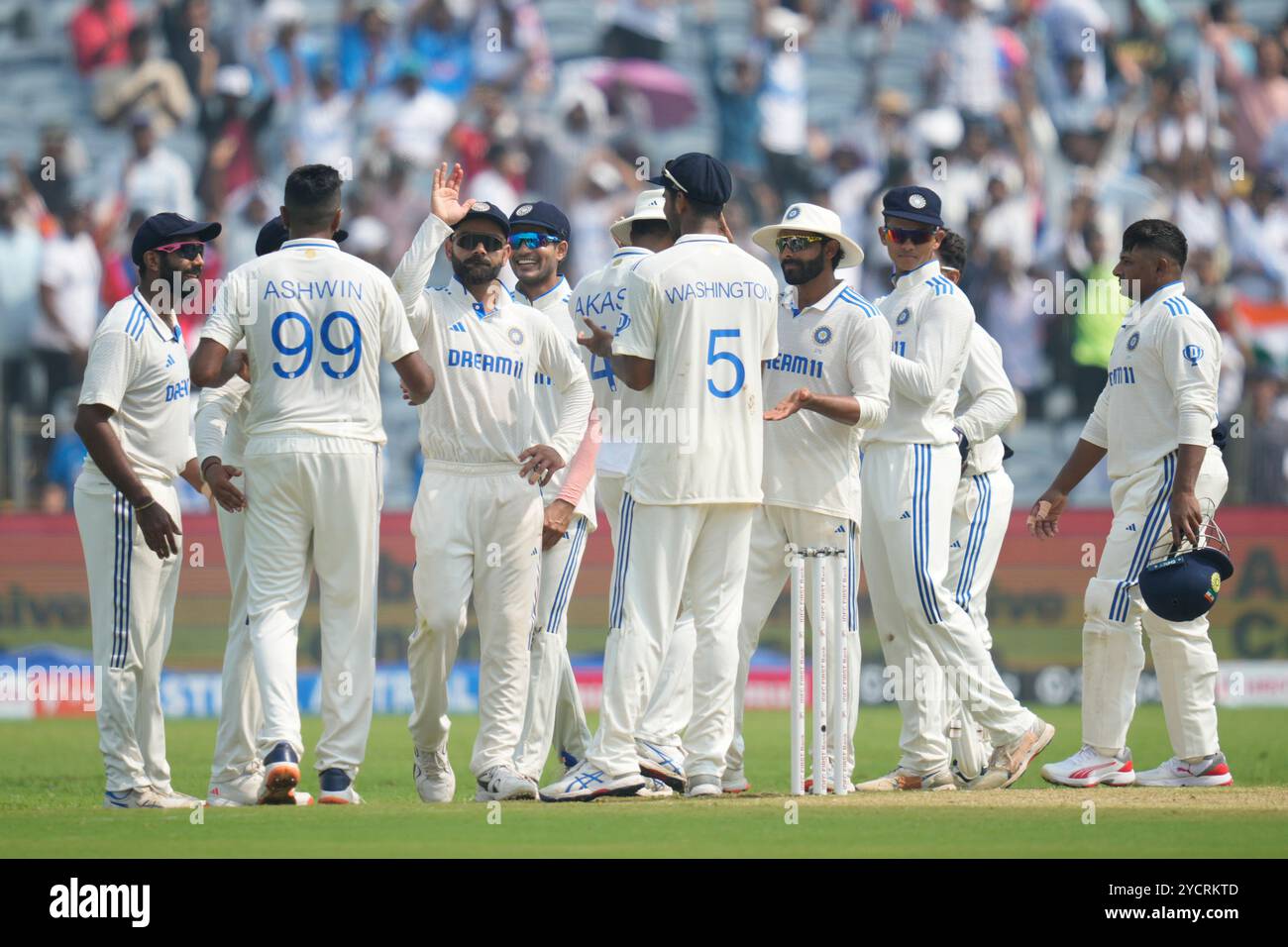 India's Ravichandran Ashwin , second from left, celebrates the ...