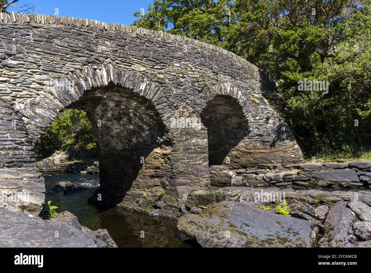 A view of the historic Old Weir Bridge at The Meeting of The Waters in ...