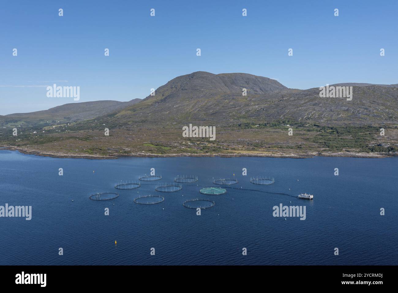 An aerial view of a salmon fish farm in Bantry Bay in County Cork of ...