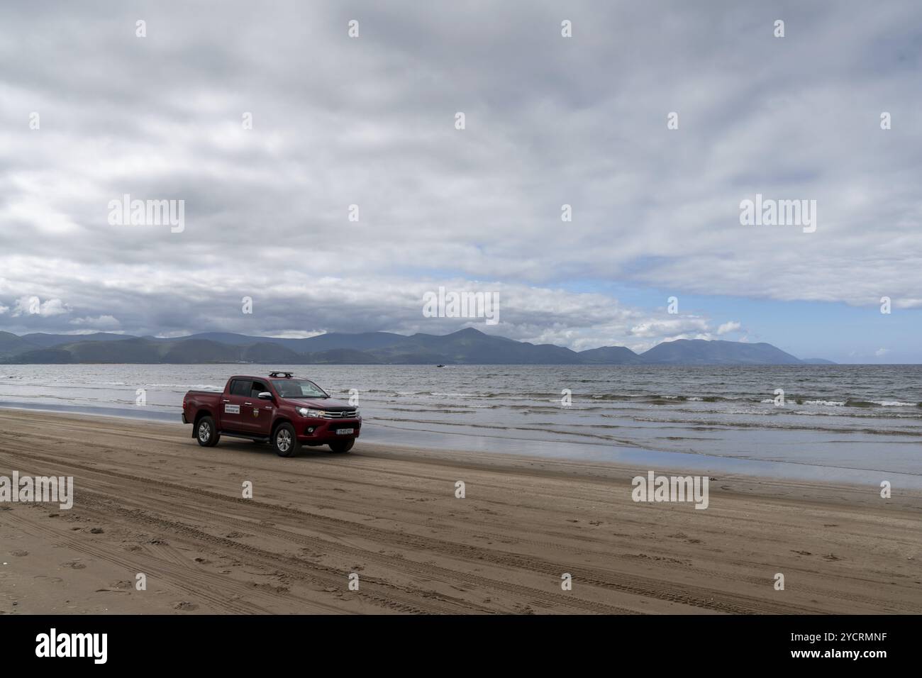 Inch Strand, Ireland, 5 August, 2022: red lifeguard pick-up truck ...