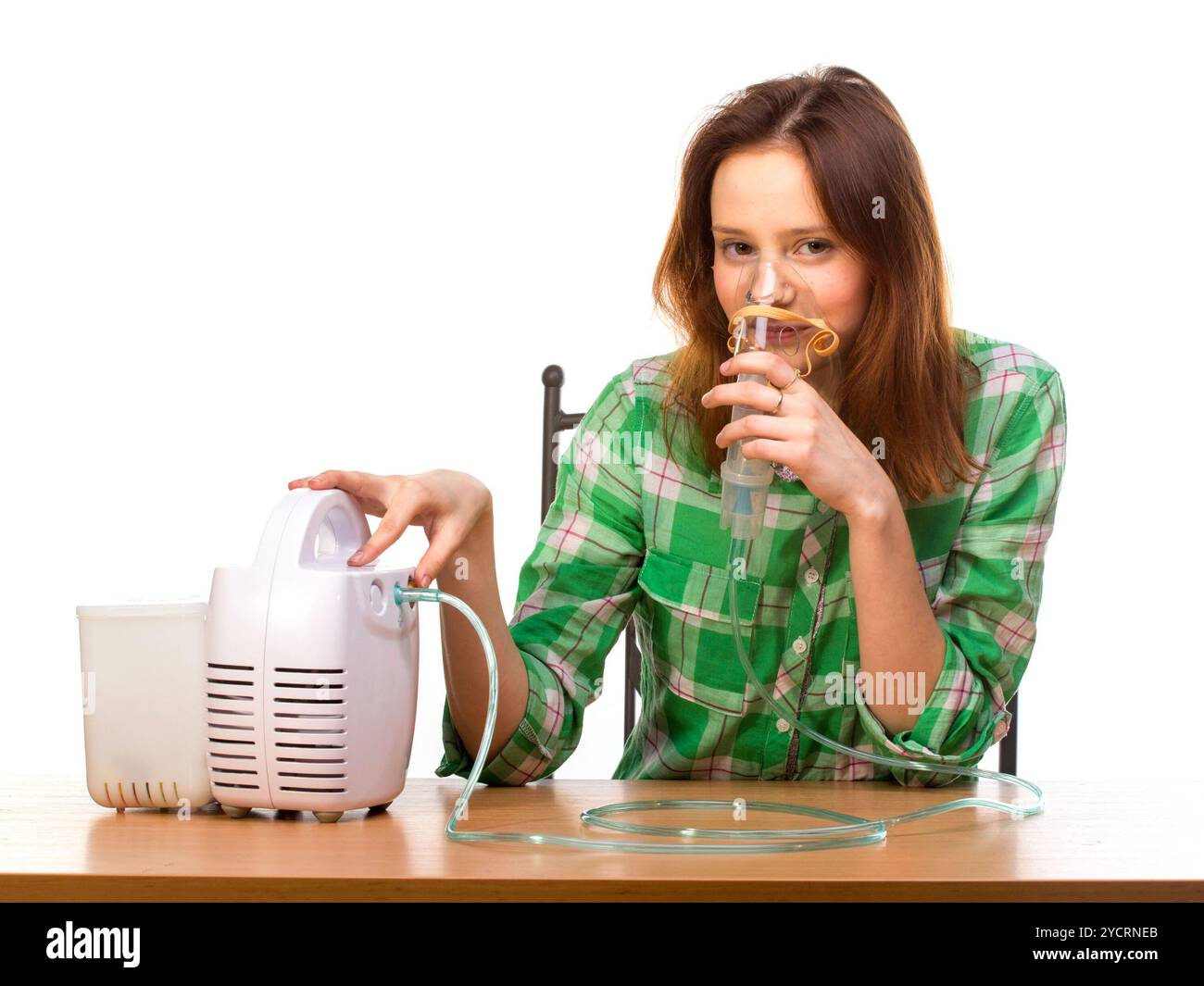 Young girl turning on respiratory inhaler for Asthma Treatment isolated ...
