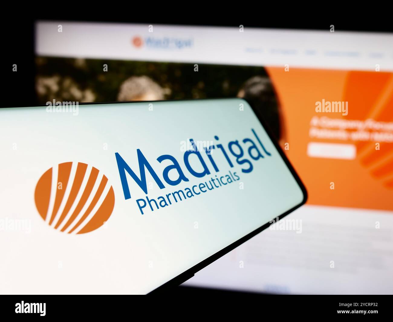 In this photo illustration, a cellphone with the logo of ...