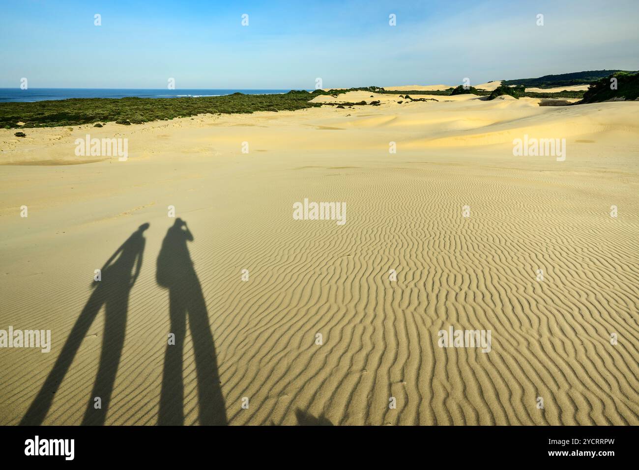 Shadows of couple on rocks at seashore hi-res stock photography and ...
