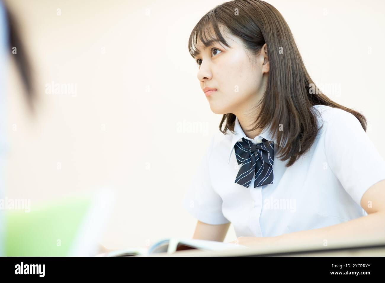 Female school students taking a class Stock Photo - Alamy