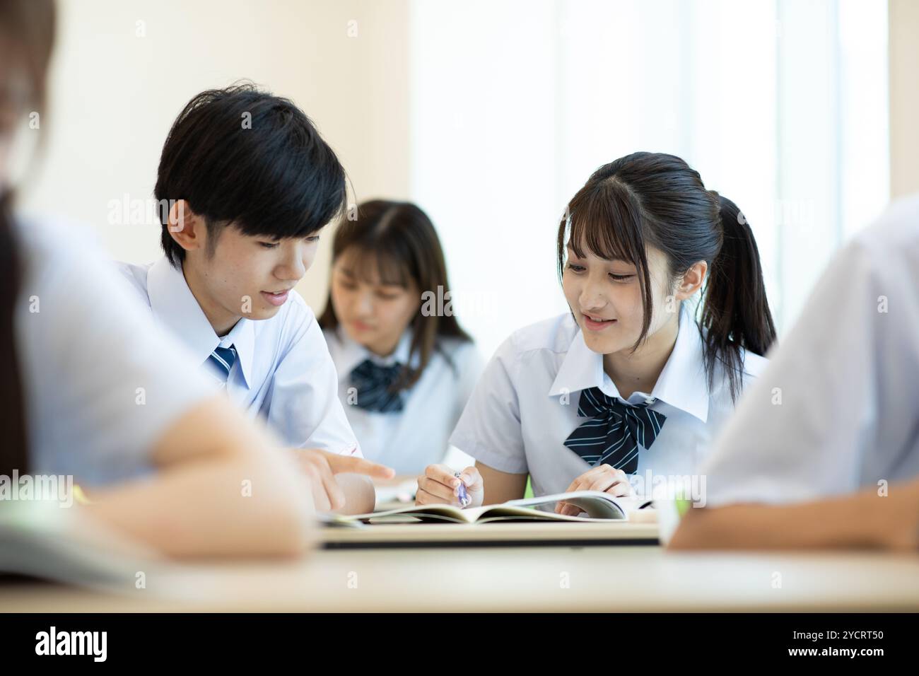 High school students studying in a classroom during recess Stock Photo ...
